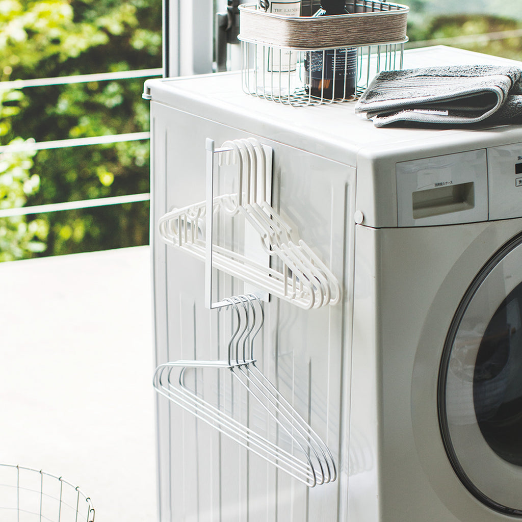 TENSION POLES & LAUNDRY RACKS